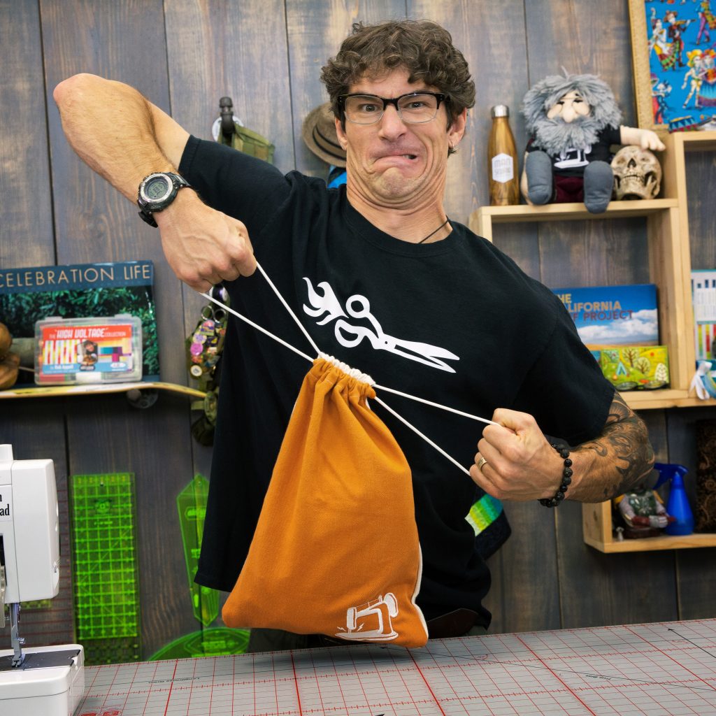 Double-Pull Drawstring Bag – Man Sewing